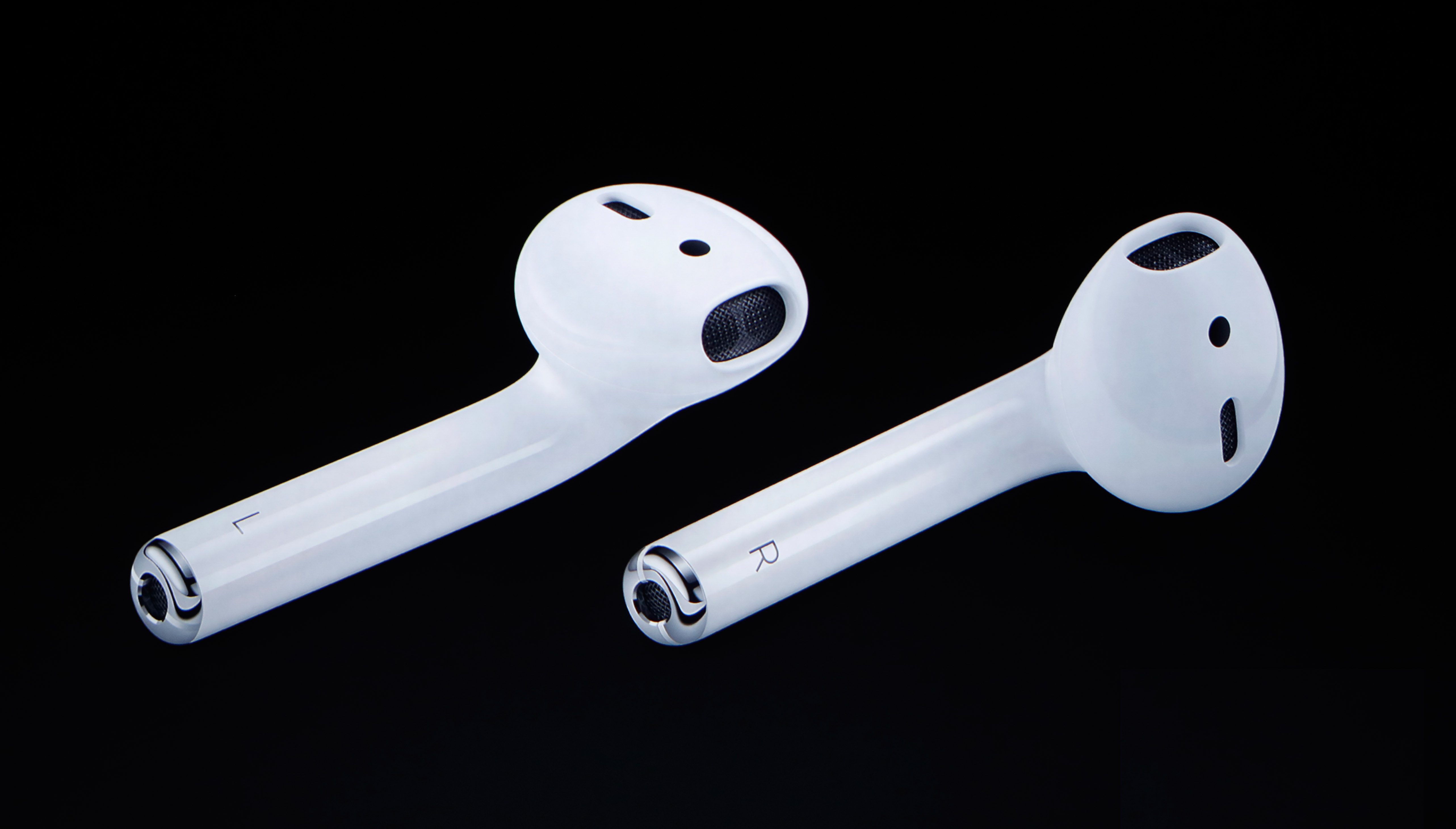 Guy Puts Realistic-Looking AirPod Stickers All Over The City, Films ...