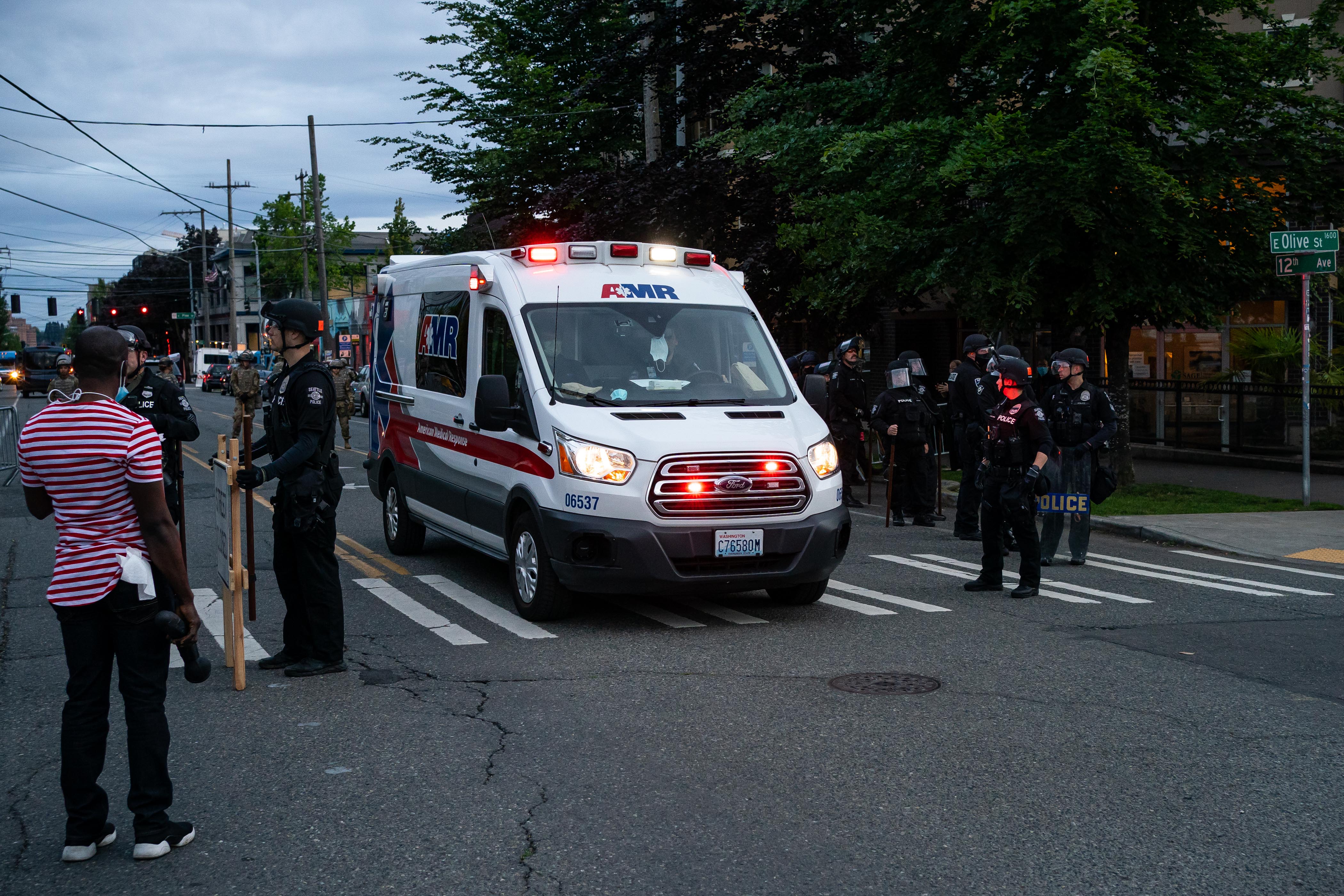 Protester Gets Shot In The Arm Trying To Stop Man From Driving Car Into ...