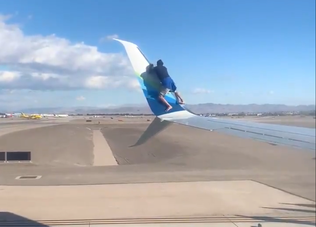 Guy Climbs On Wing Of Plane Before Takeoff, Obviously Doesn't Know How ...