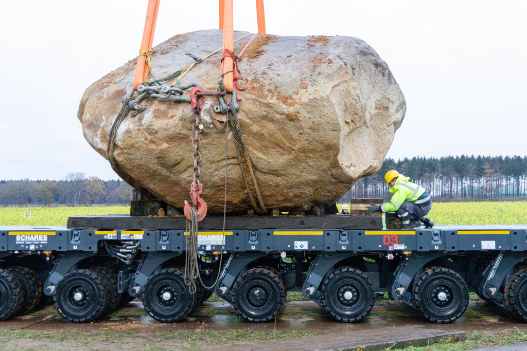 There Is A Large Boulder That Is Larger Than A Small Boulder Blocking ...