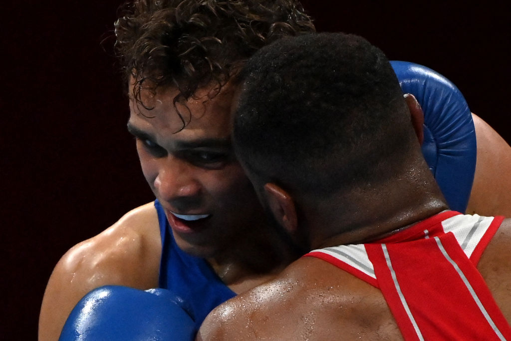 Olympic Boxer Disqualified After Trying To Bite His Opponent's Ear Off