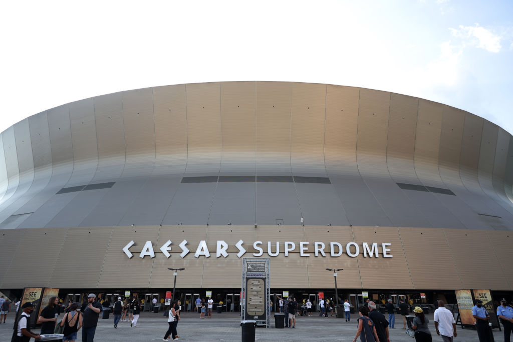 The Superdome Roof Caught Fire And The Image Of One Man's Attempt To ...