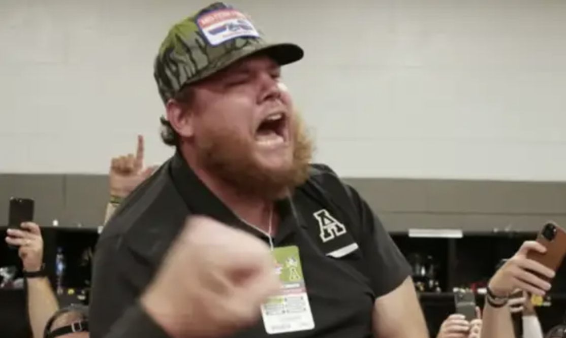 Luke Combs Sings 'Beer Never Broke My Heart' In App State Locker Room