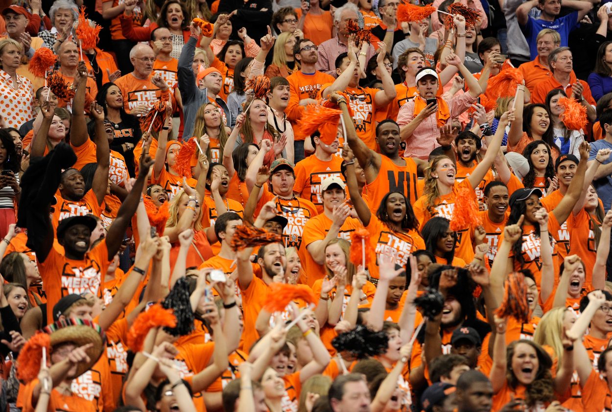 College Basketball Fan In Overalls Uses Very Creative Sign To Troll Refs