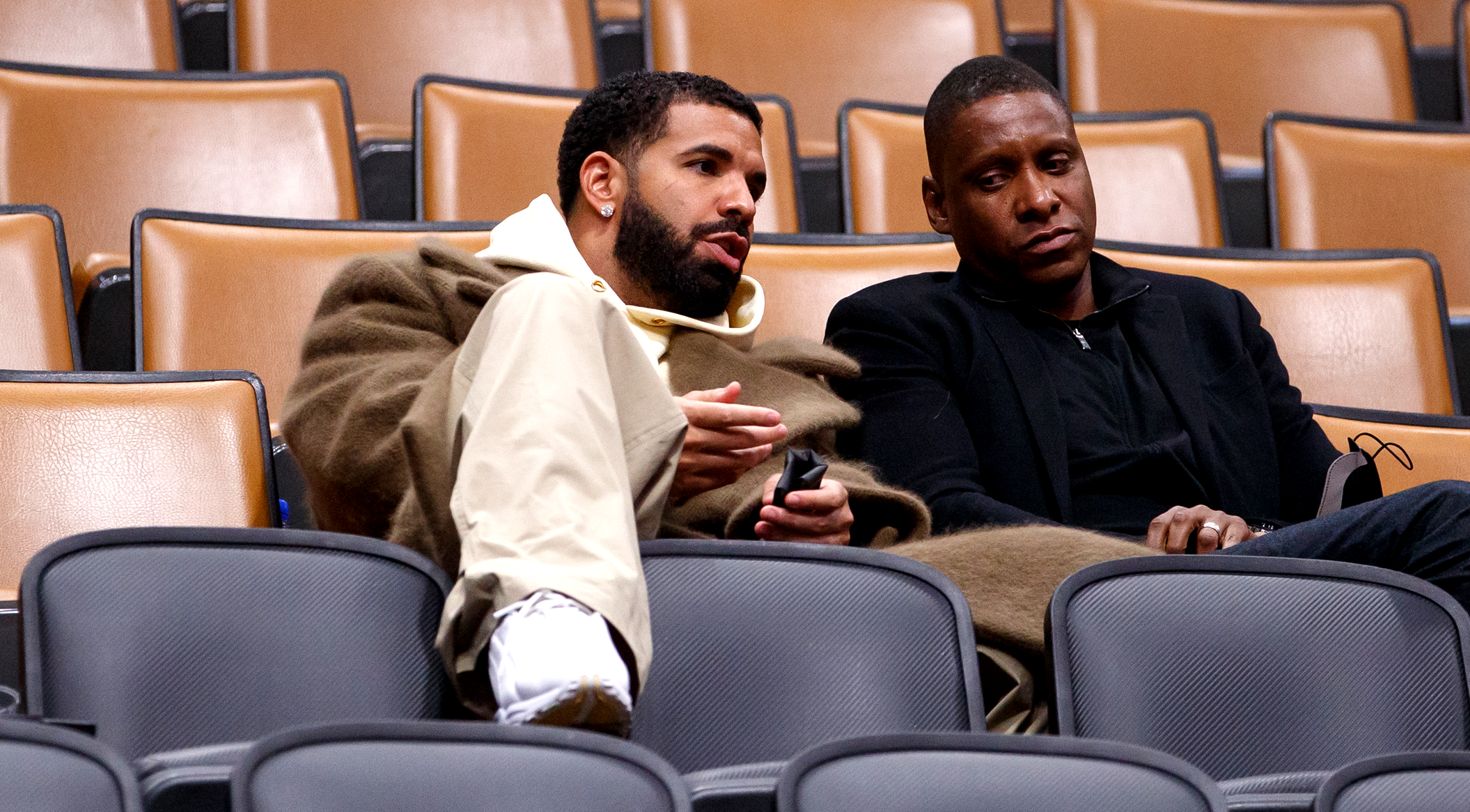 Drake Looking At His Phone During Raptors Game Inspires a New Meme