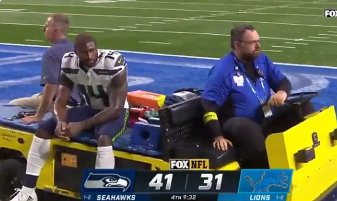 DK Metcalf Was Carted Off The Field To Poop And Fans Had Jokes - BroBible