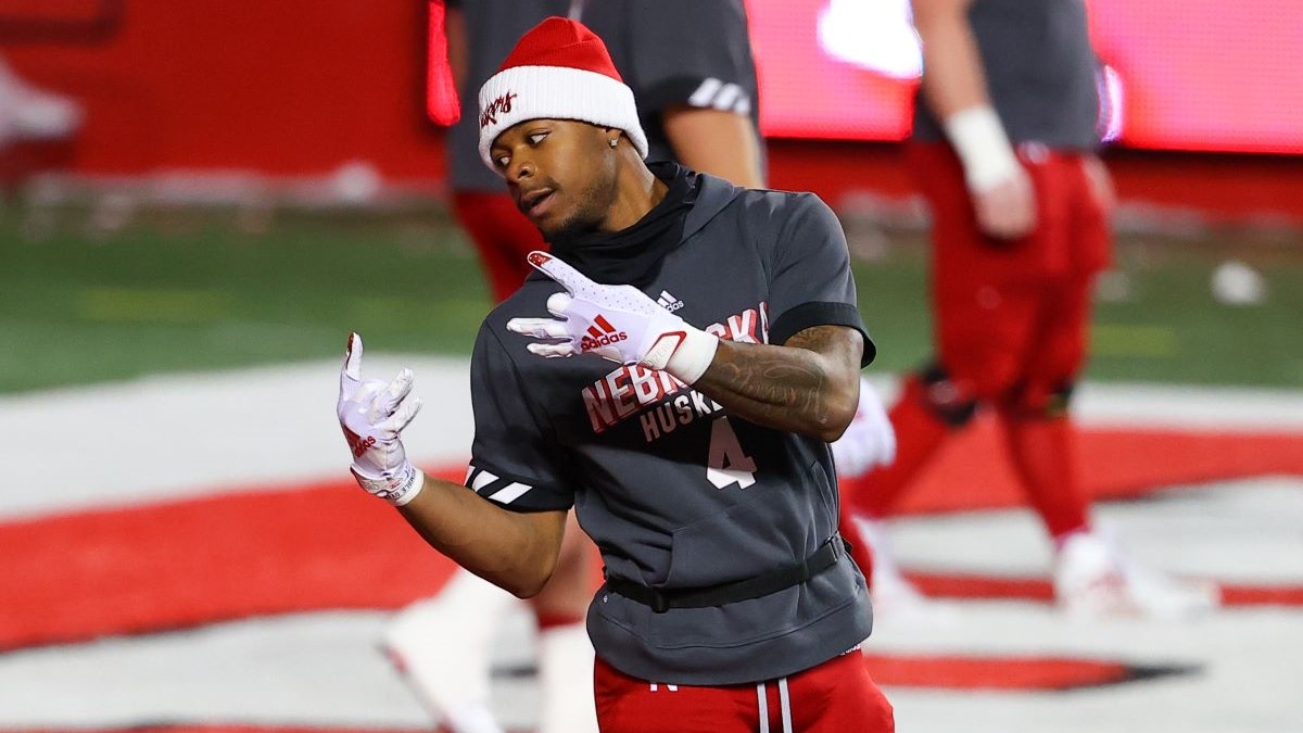 Nebraska WR Gets A Helmet To The Junk Trying To Hurdle A Defender