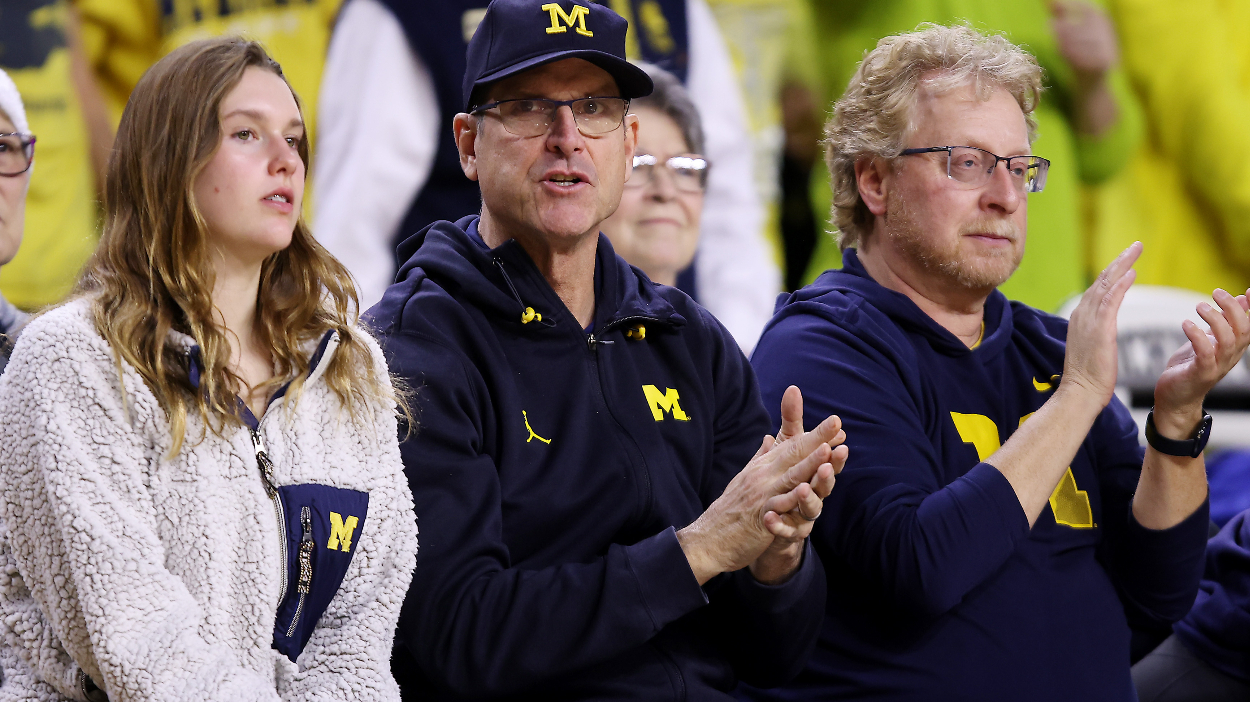 Jim Harbaugh Helps Police Pull Tree From Road In Michigan Ice Storm
