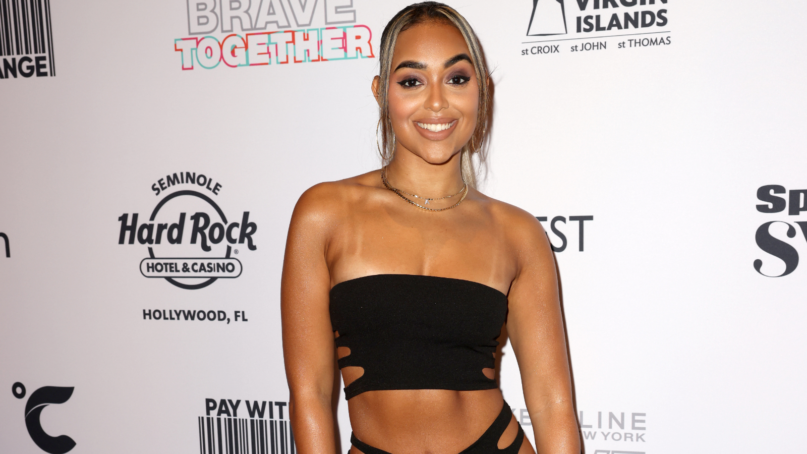 Ashley Nicole Moss Counters Noah Lyles' 'World Champs' Take