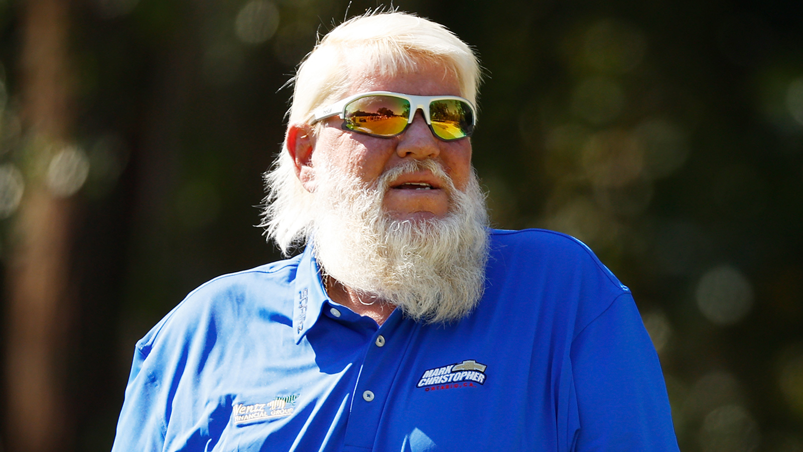 WATCH: John Daly Kicks Barefoot Field Goal Off Of His Own Shoe
