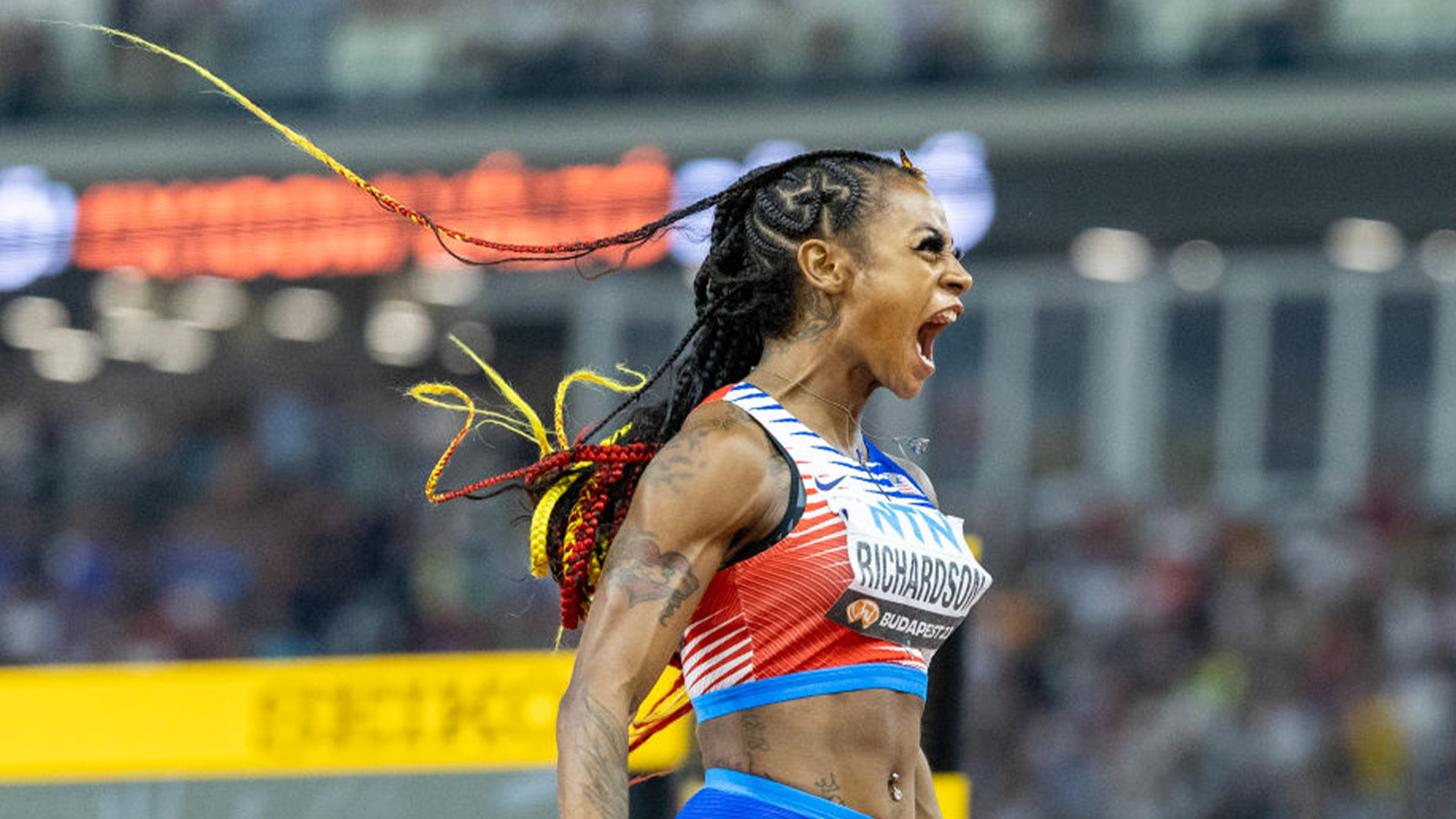 Sha'Carri Richardson Rips Fan, Reveals Meaning Of Natural Hair
