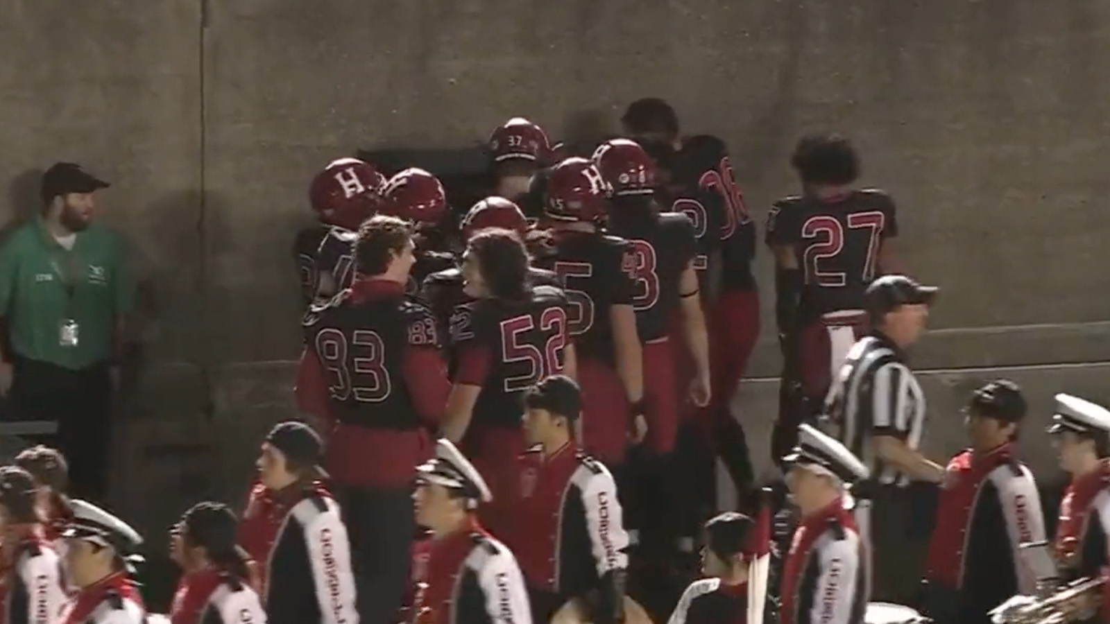 Harvard Football's Absurdly Small Tunnel Creates Hilarious Visual