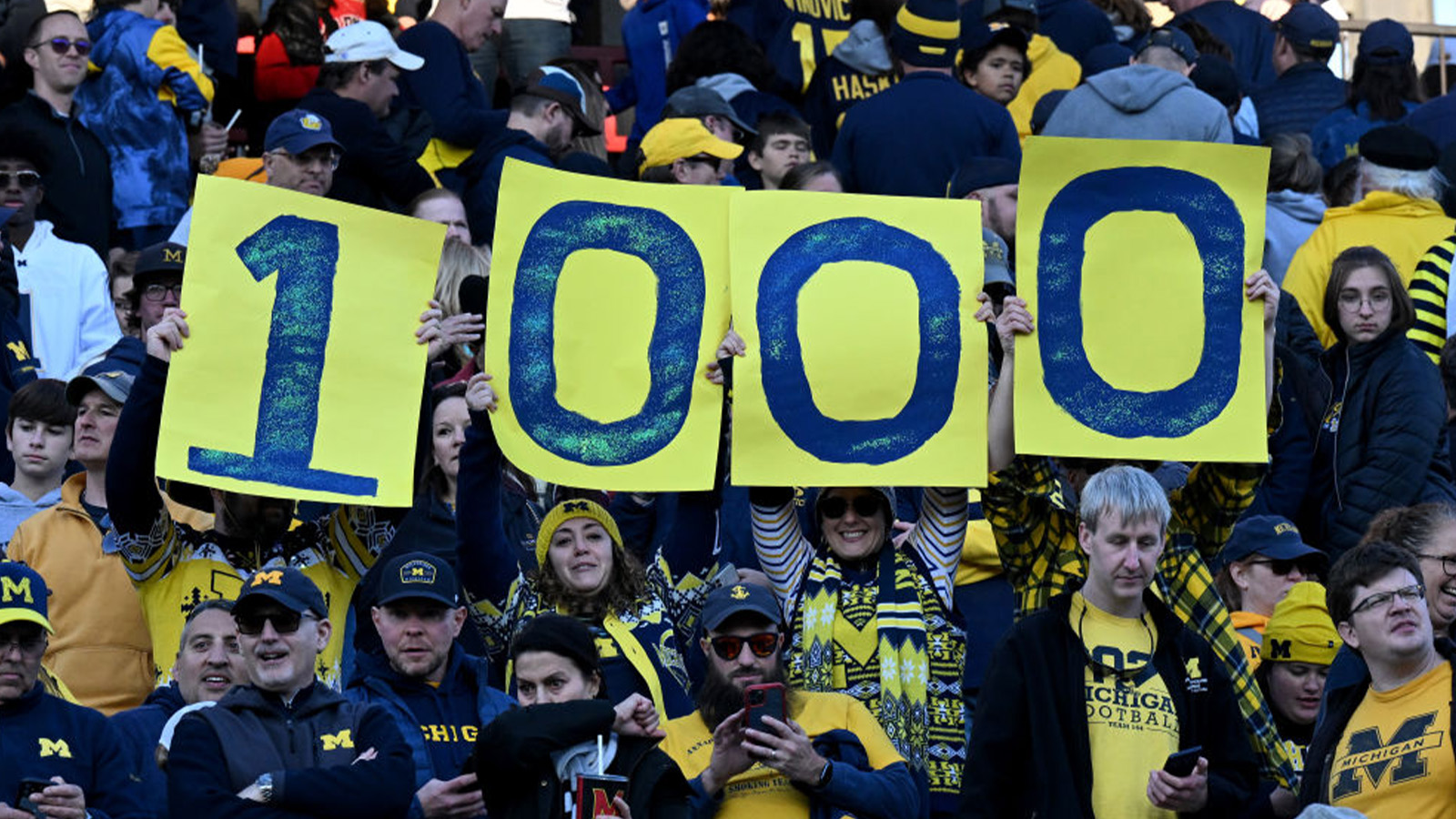Michigan Fans Get Yelled At For Storming The Field On The Road