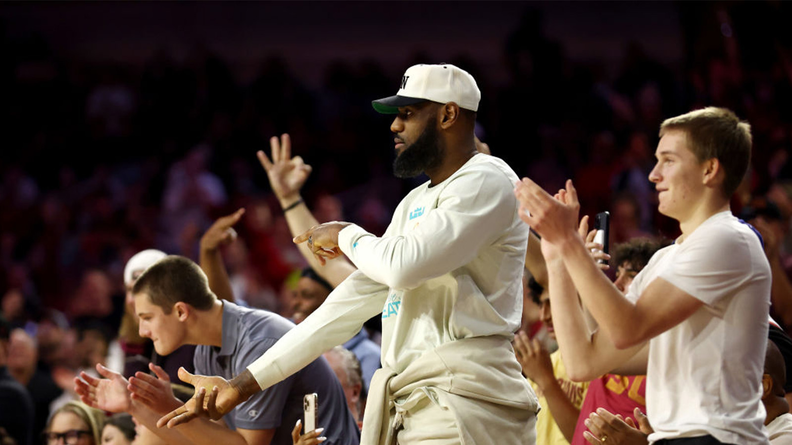 LeBron James Sends Courtside USC Fan Into Shock With Viral Arrival