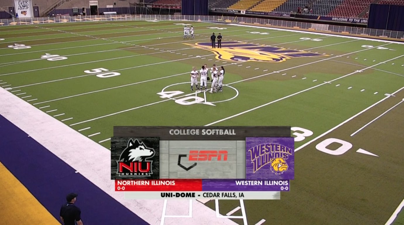 D1 Softball Game Played Inside Domed Football Stadium Is Bizarre