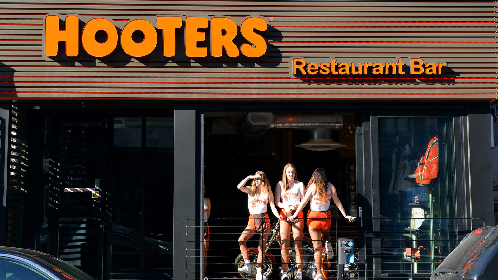 Hundreds Attend Candlelight Vigil At Hooters Before Its Demolition