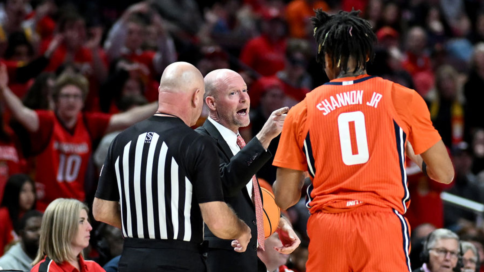 College Basketball Coach Bizarrely Grabs Live Ball & Taunts Player
