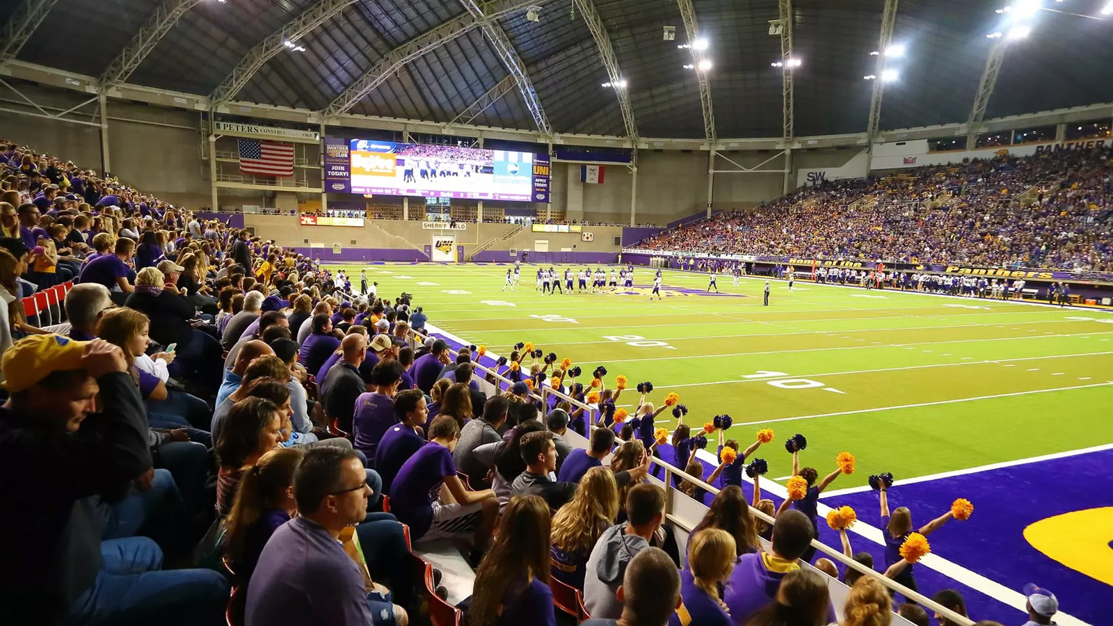 D1 Softball Game Played Inside Domed Football Stadium Is Bizarre