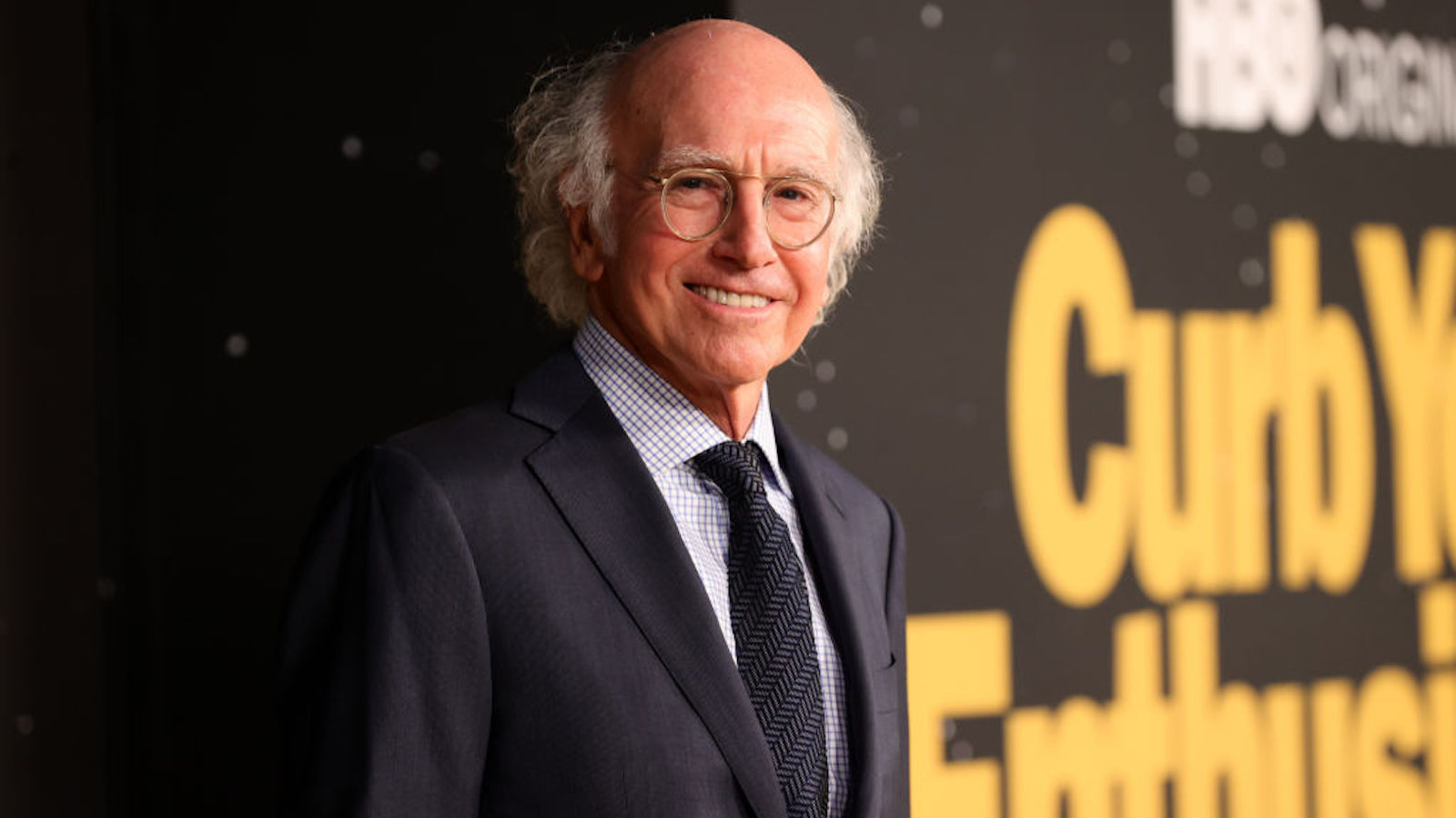Larry David Says He Eats Snacks In Bathroom To Escape Dogs