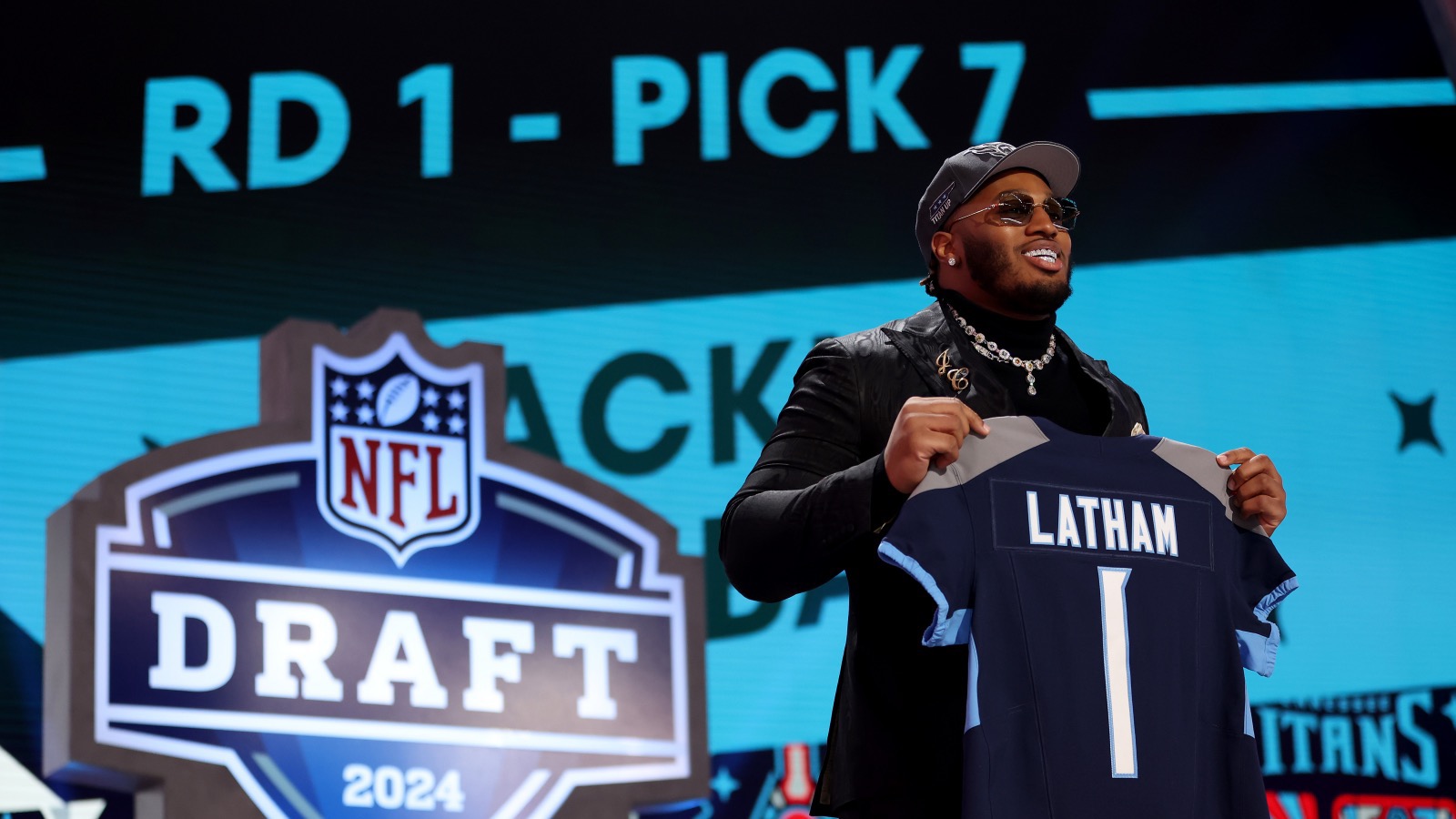 Titans' JC Latham Struggles To Move One Of A Kind Blocking Sled