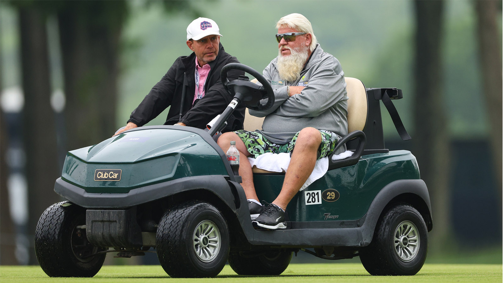 John Daly Rips A Cig, Goes Viral In Iconic Photo With Tiger Woods