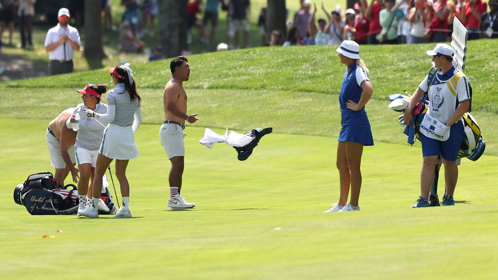 Bizarre Moment At Solheim Cup Leads To Shirtless Caddies