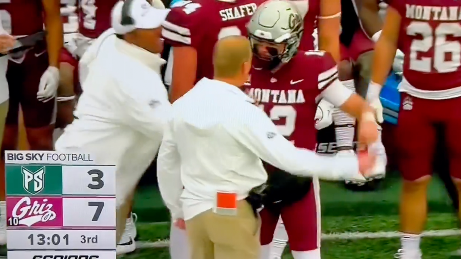 College Quarterback Forcibly Restrained After Charging At Coach