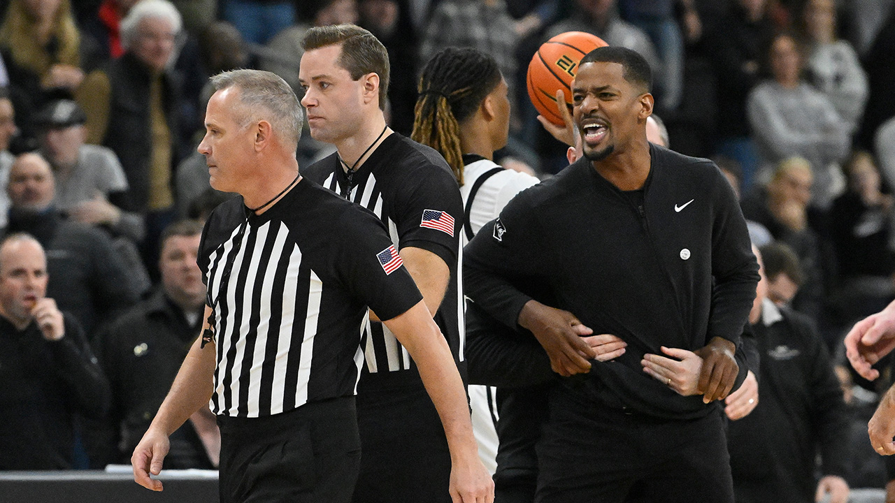 Providence Basketball Coach Restrained After Charging Referee