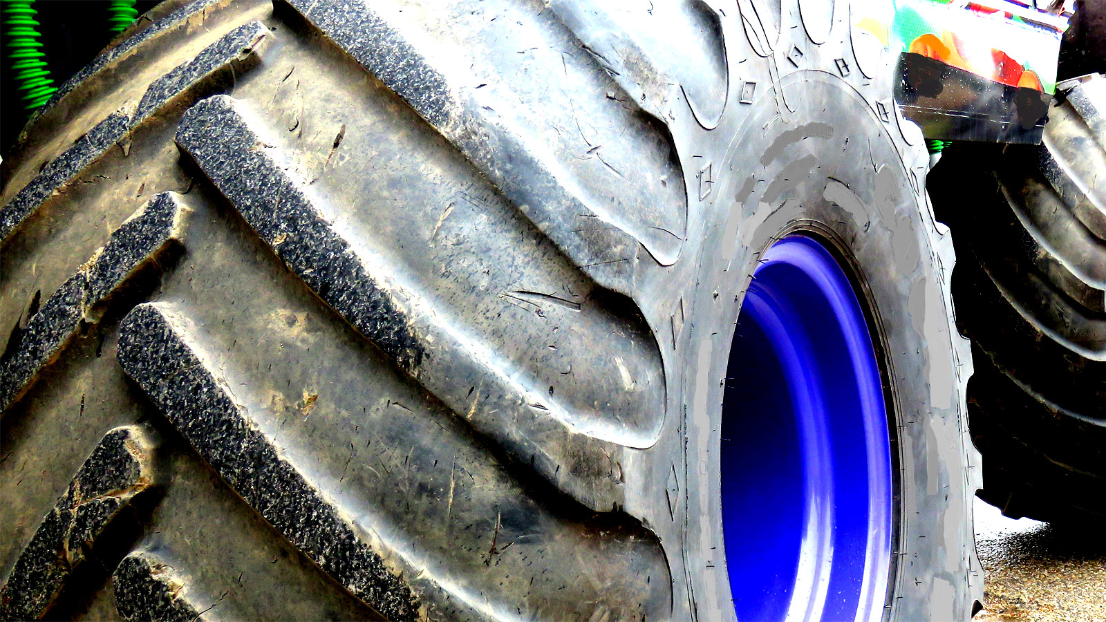 Giant Monster Truck Tire Flies Off And Crushes Fan's Car