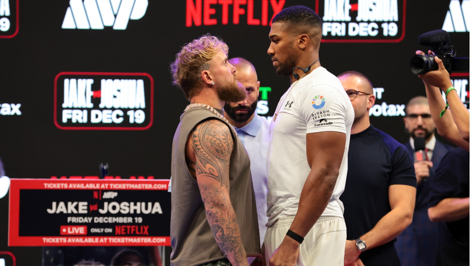 Anthony Joshua Towers Over Jake Paul In First Faceoff
