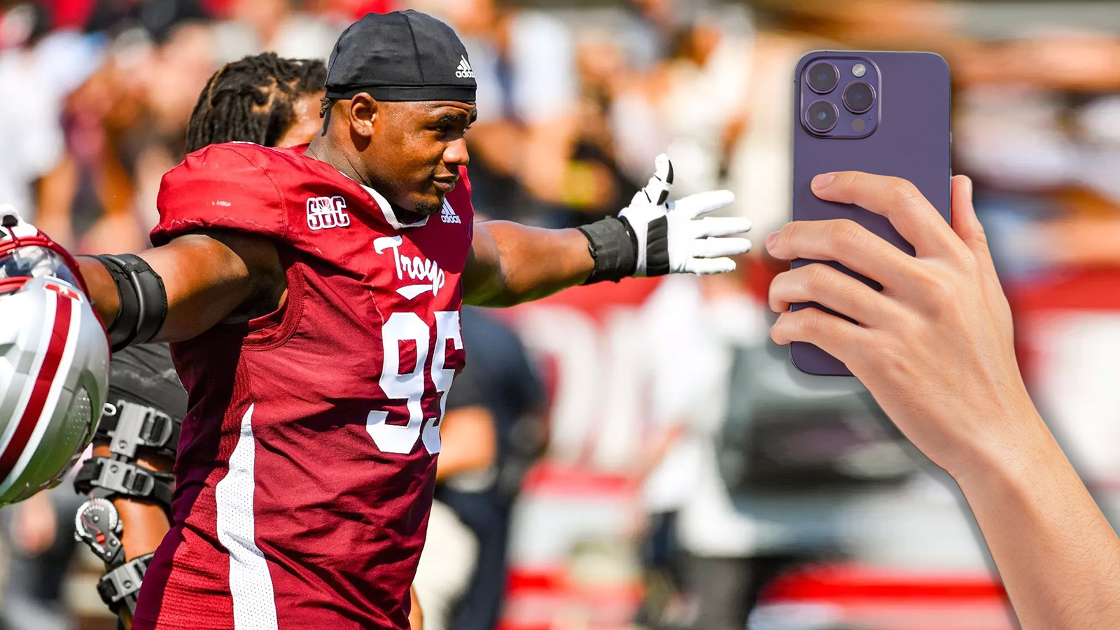 Troy Football Captain Steals James Madison Fan's Phone: VIDEO