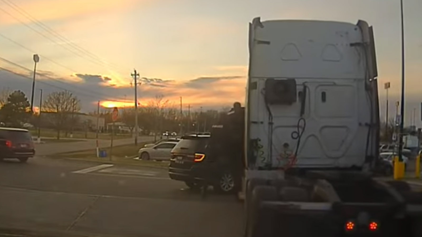 Ohio Police Officer Clings To Door Of Semi Trying To Stop Suspect