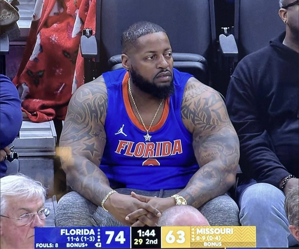 Florida's 7-Foot-9 Phenom Dwarfs Viral Fan With Monster Biceps